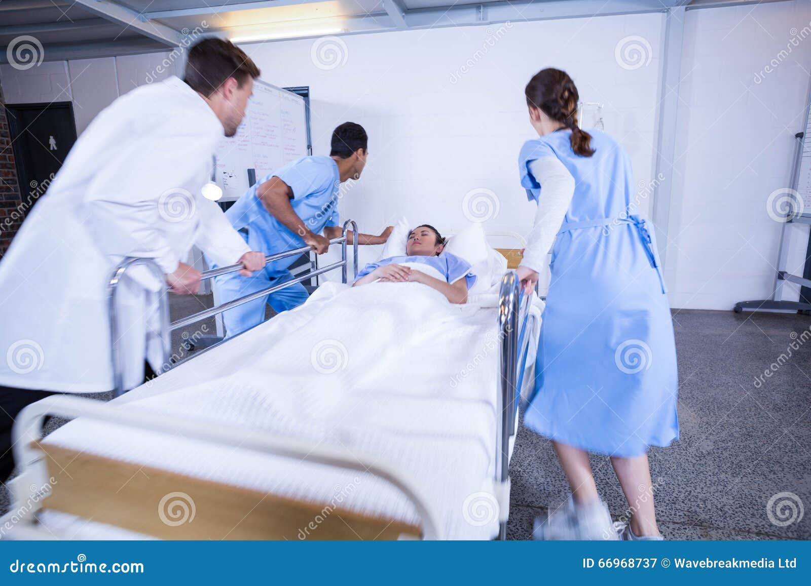 Doctors Standing Near Patient Bed Stock Image - Image of care, group ...