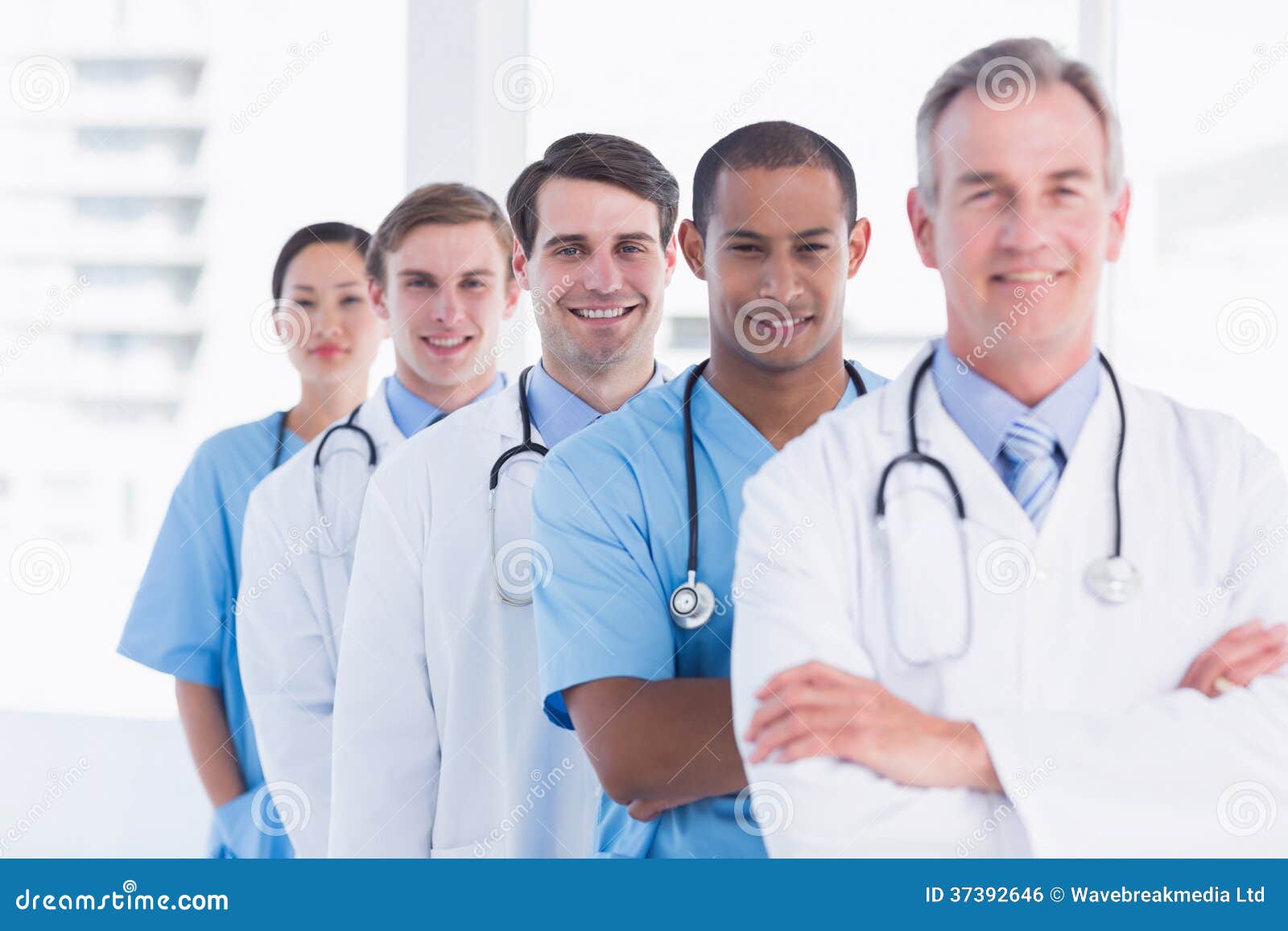 Doctors Standing in a Row at Hospital Stock Photo - Image of woman ...