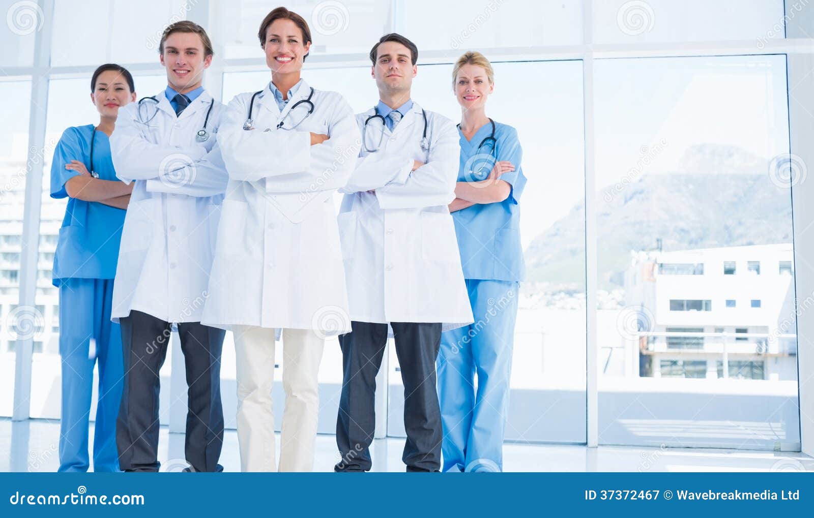 Doctors Standing Together at Hospital Stock Image - Image of healthcare ...