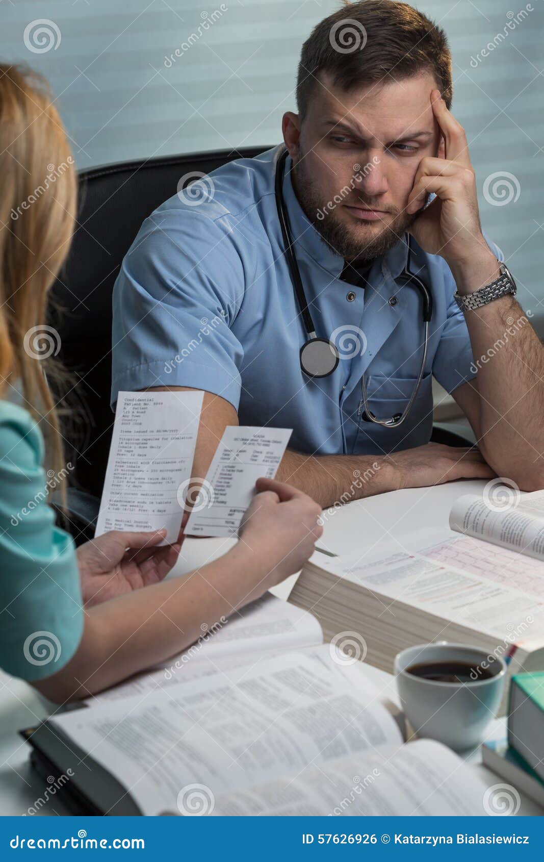 Doctors studying books stock photo. Image of physician - 57626926