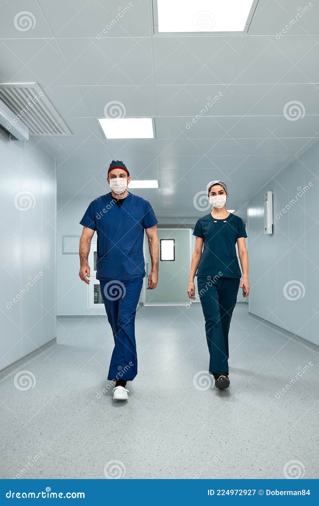 Doctors Surgeons Walk Along the Corridor of the Clinic in Suspense ...