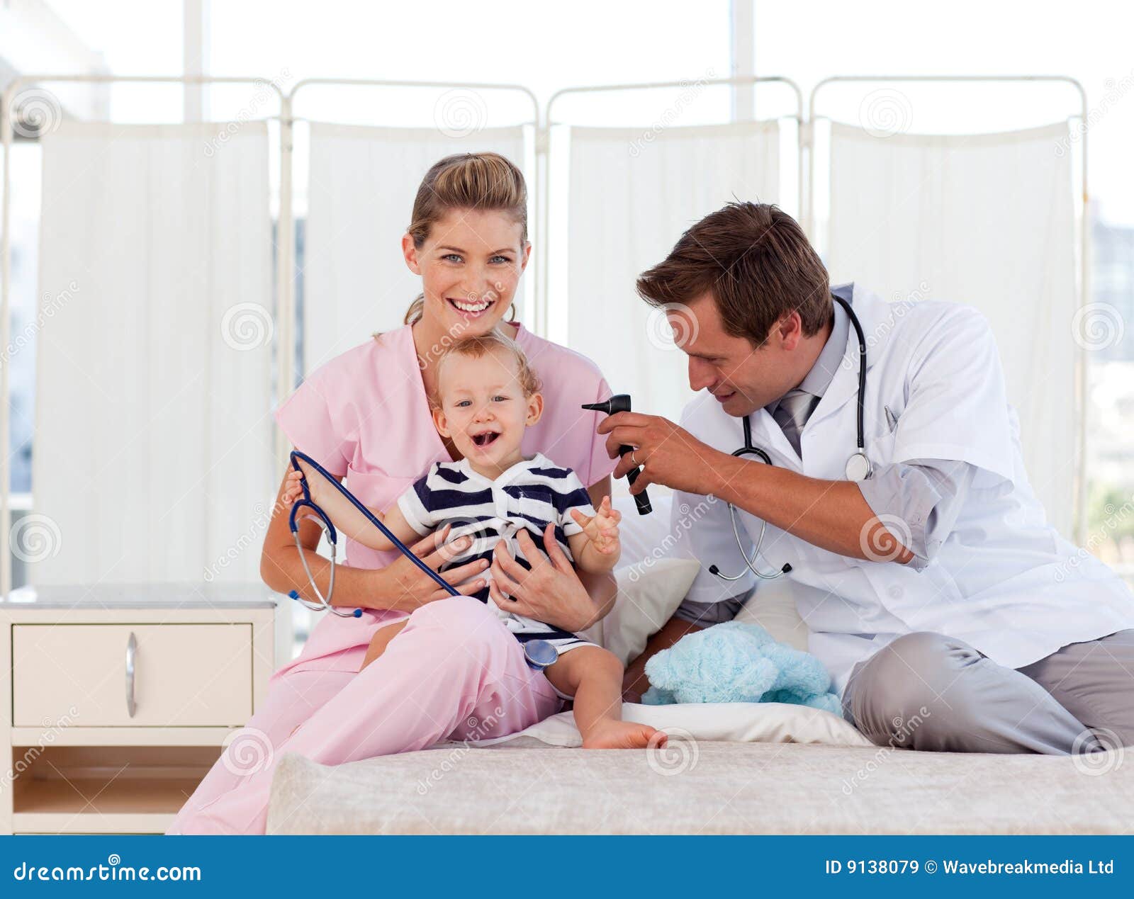 Doctors Taking Care of a Young Child Stock Image - Image of accessory ...