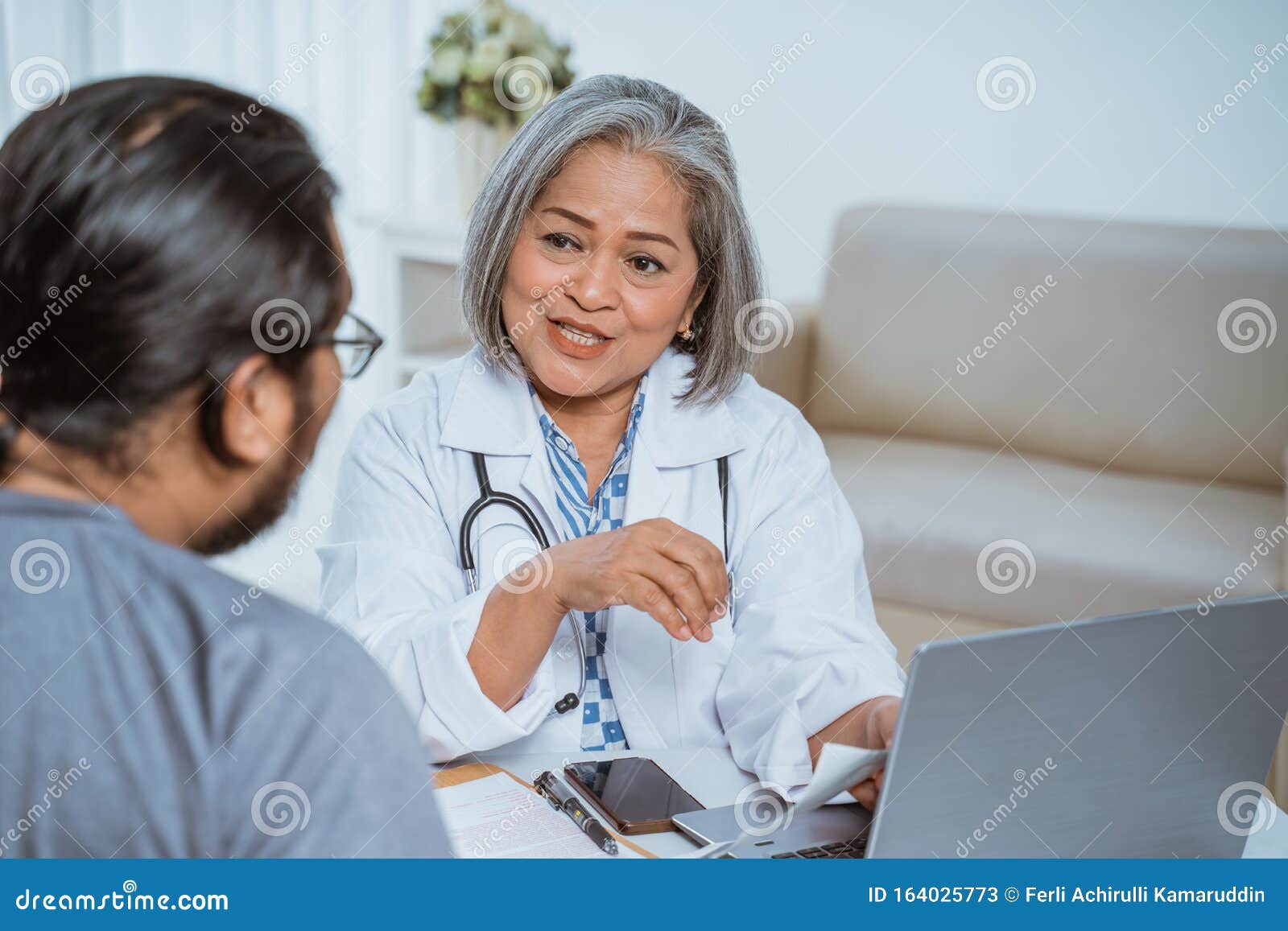 Doctors talk with patients stock image. Image of human - 164025773