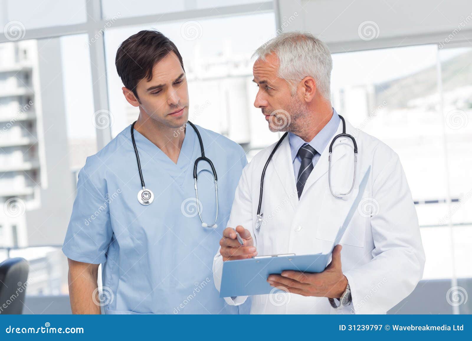 Doctors Talking about a File Stock Image - Image of doctor, staff: 31239797