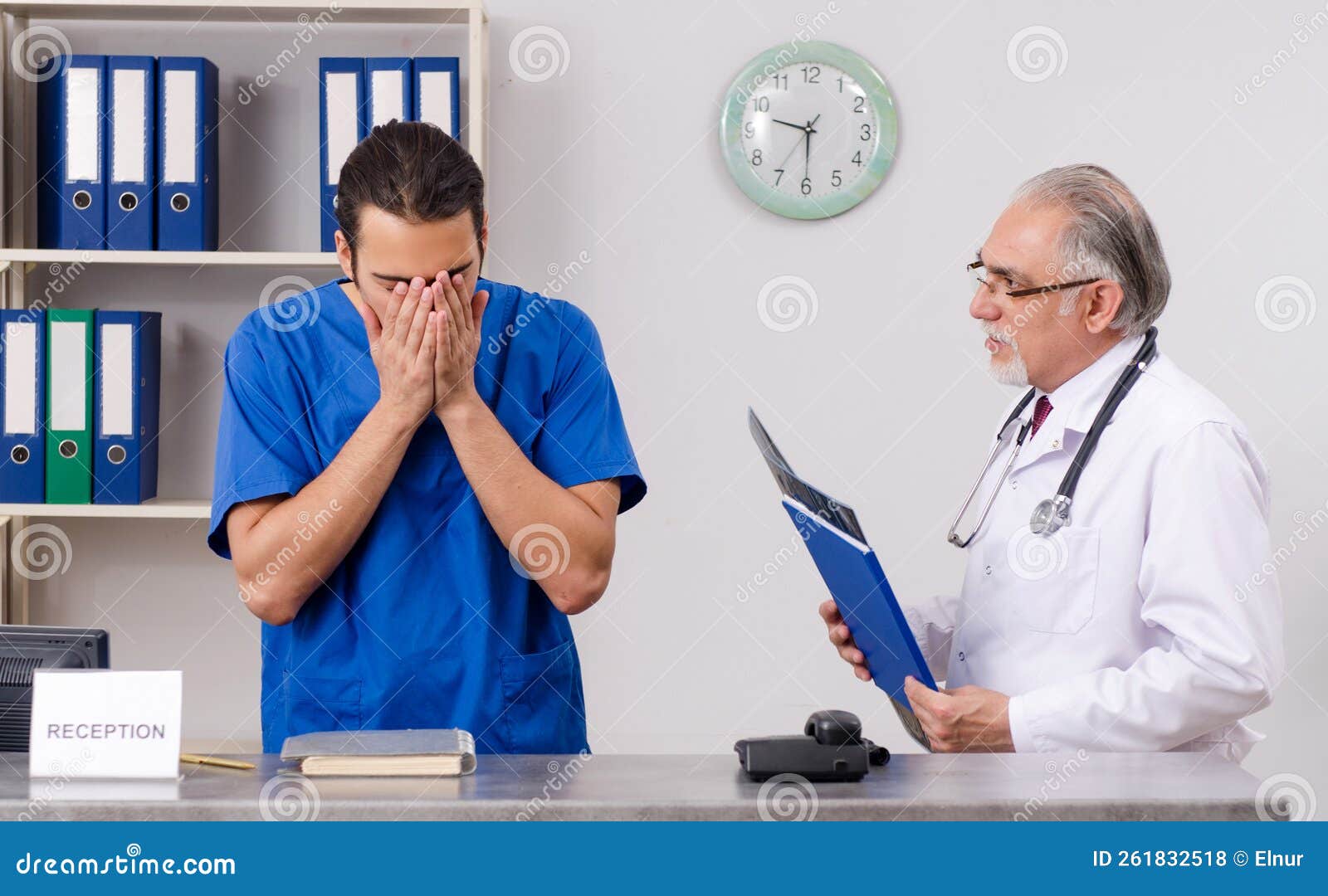 Two Doctors Talking at the Reception in Hospital Stock Photo - Image of ...