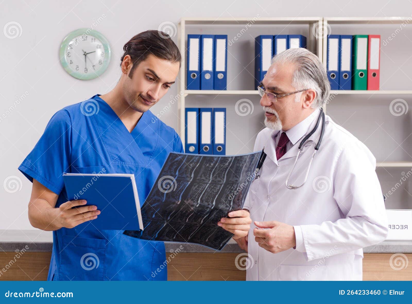 Two Doctors Talking at the Reception in Hospital Stock Photo - Image of ...