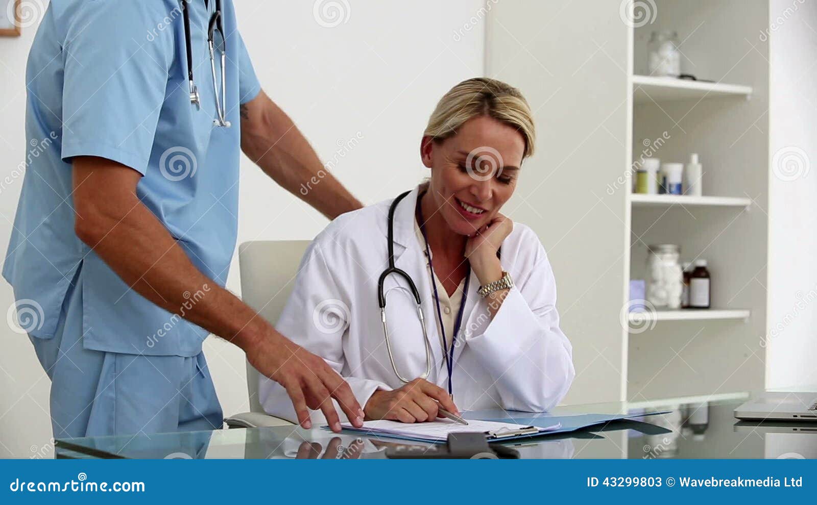 Doctors Talking Together while Talking about a Patient Stock Video ...