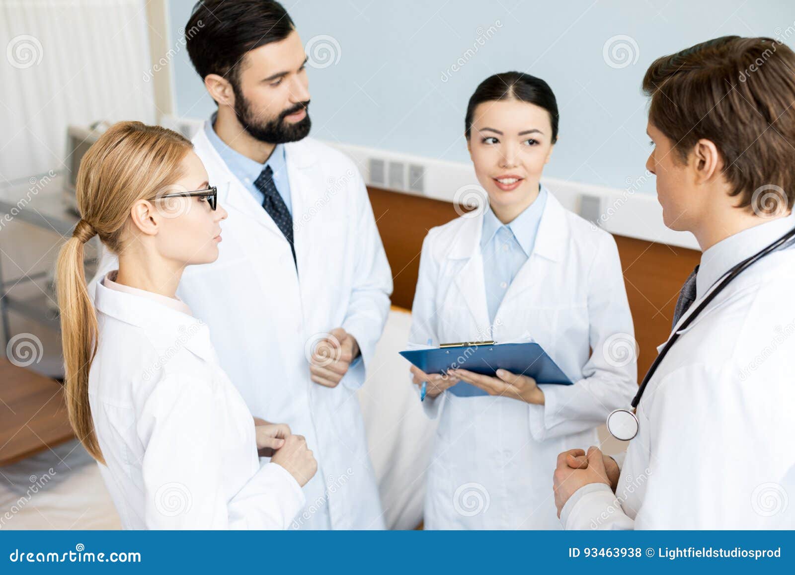 Doctors Team Discussing Diagnosis Stock Photo - Image of conversation ...