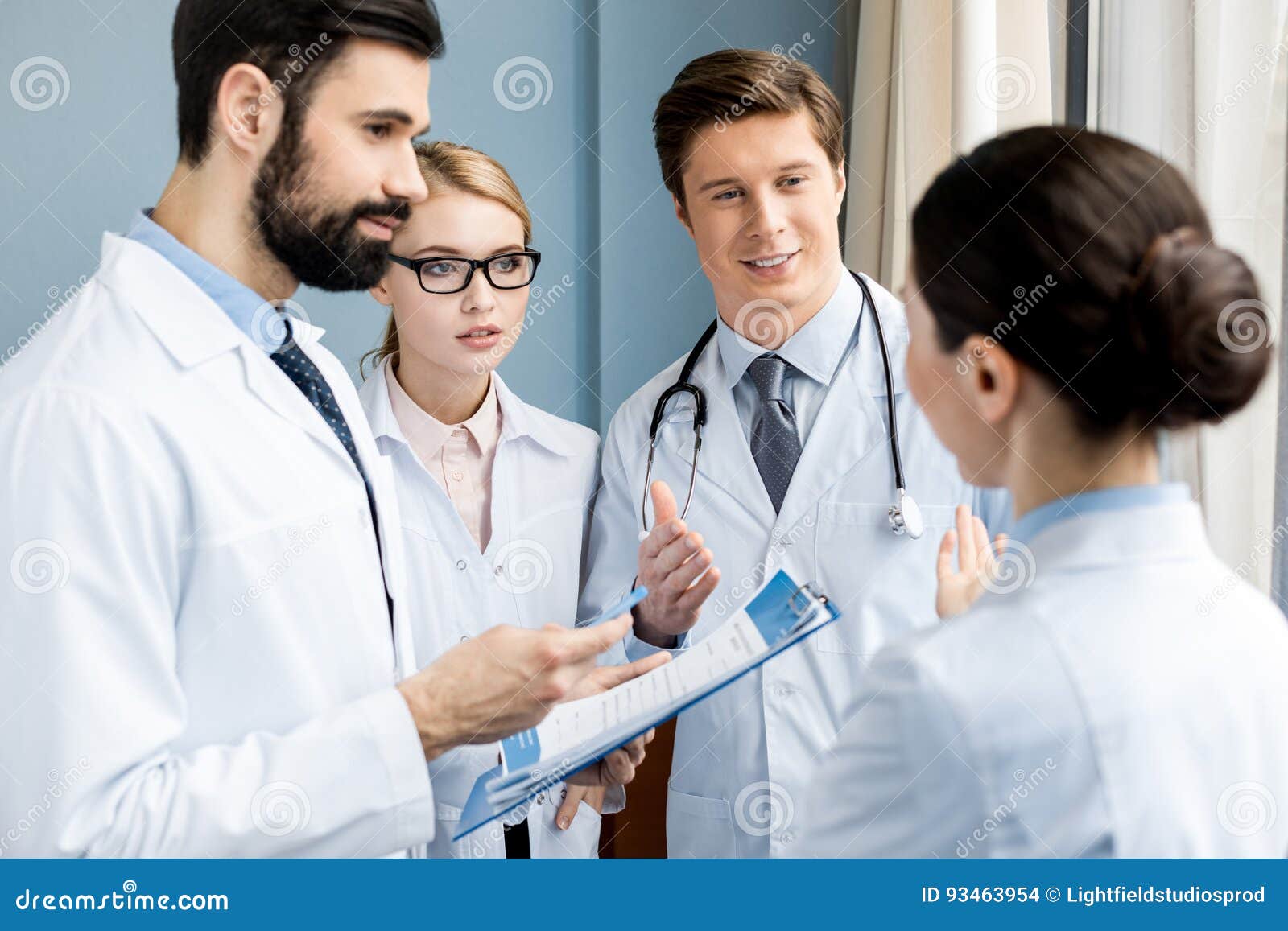 Doctors Team Discussing Diagnosis Stock Photo - Image of discussion ...
