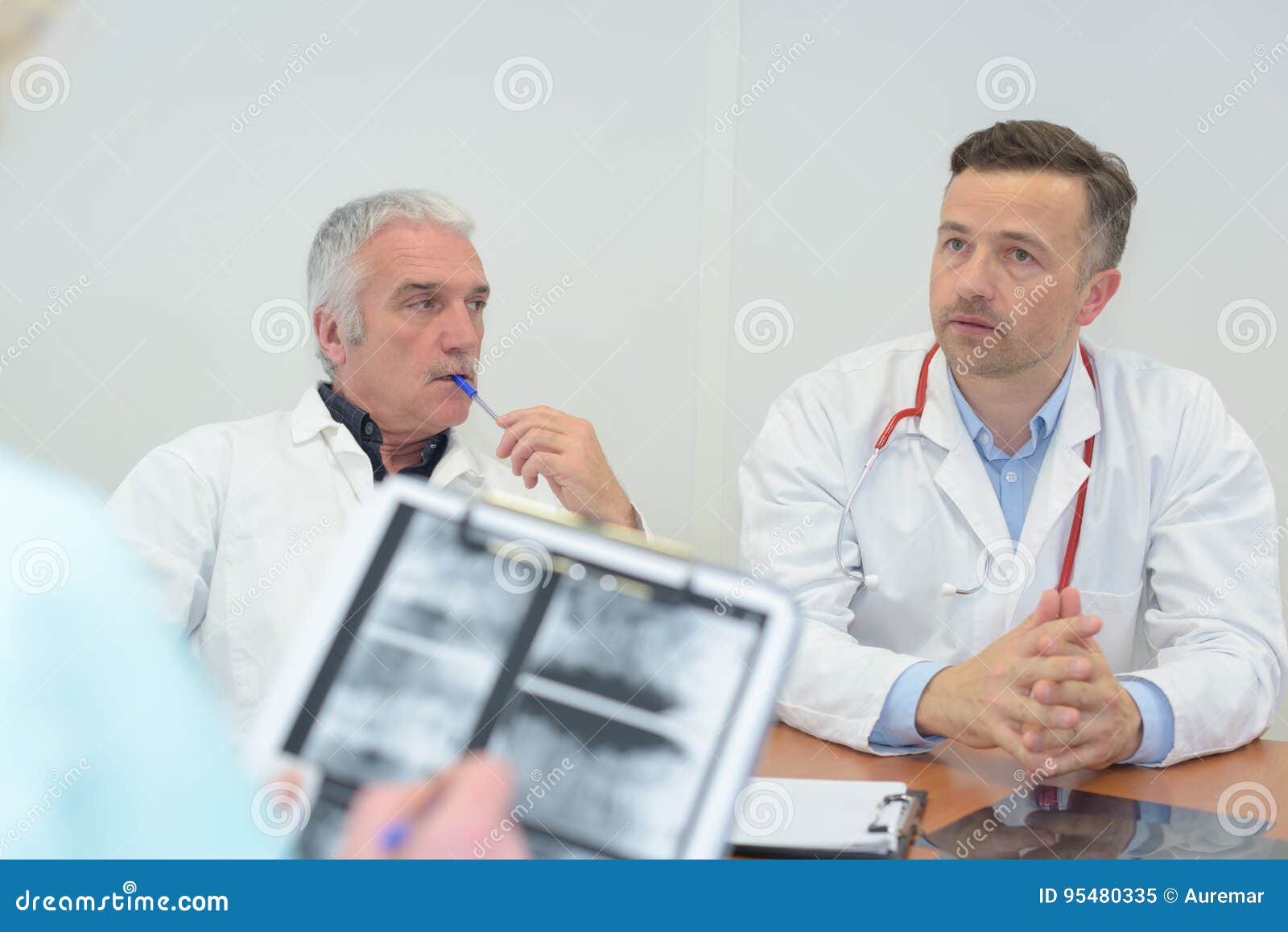 Doctors Thinking Best Decision To Treat Patient Stock Image - Image of ...