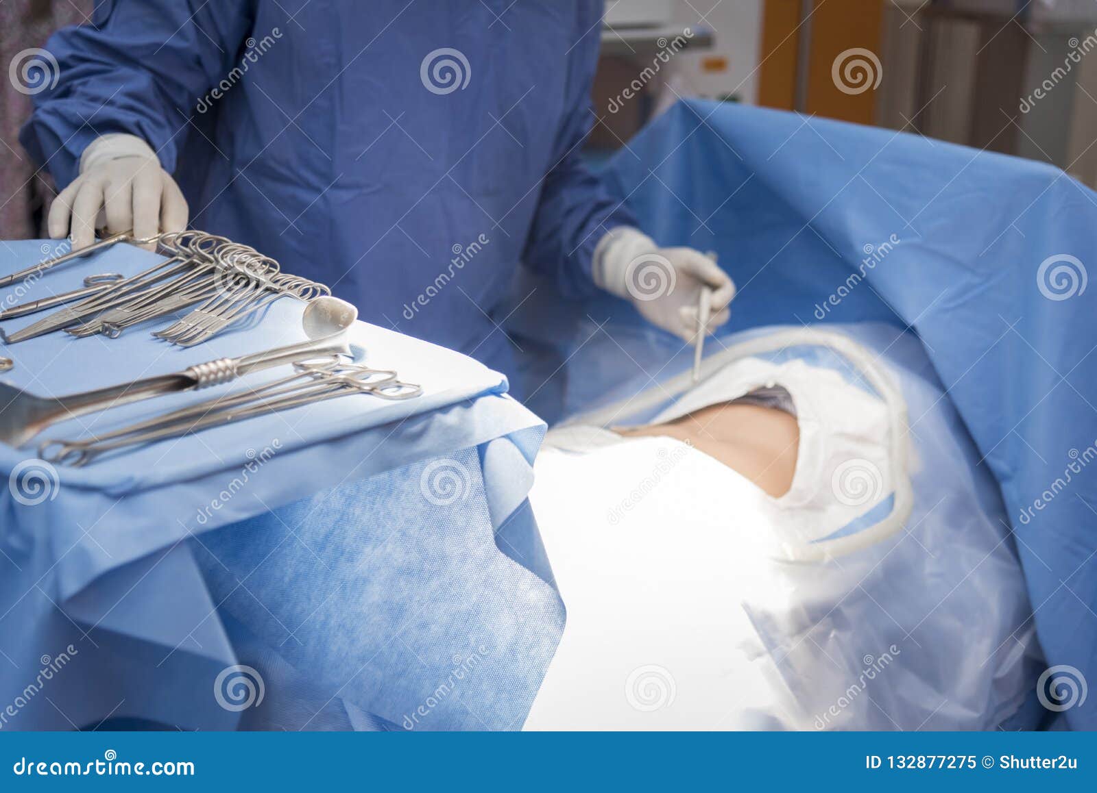 Doctors with Tools in Hands Making Surgery in Operation Room. he Stock ...
