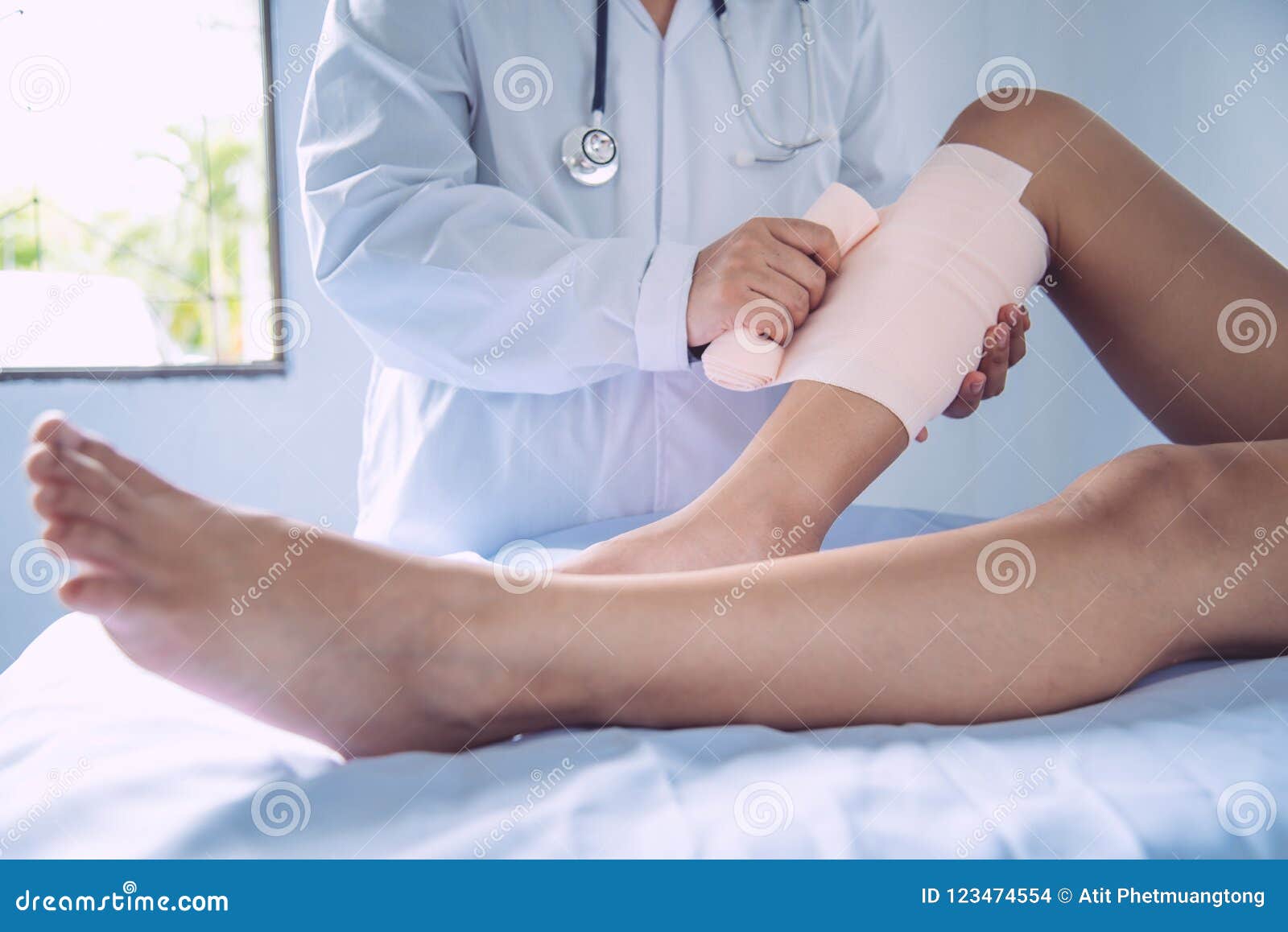 Doctors are Treating Patients with Leg Injuries Stock Photo - Image of ...