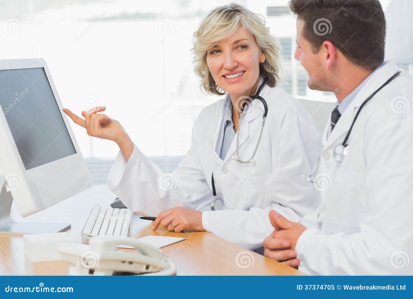 Doctors Using Computer at Medical Office Stock Image - Image of service ...