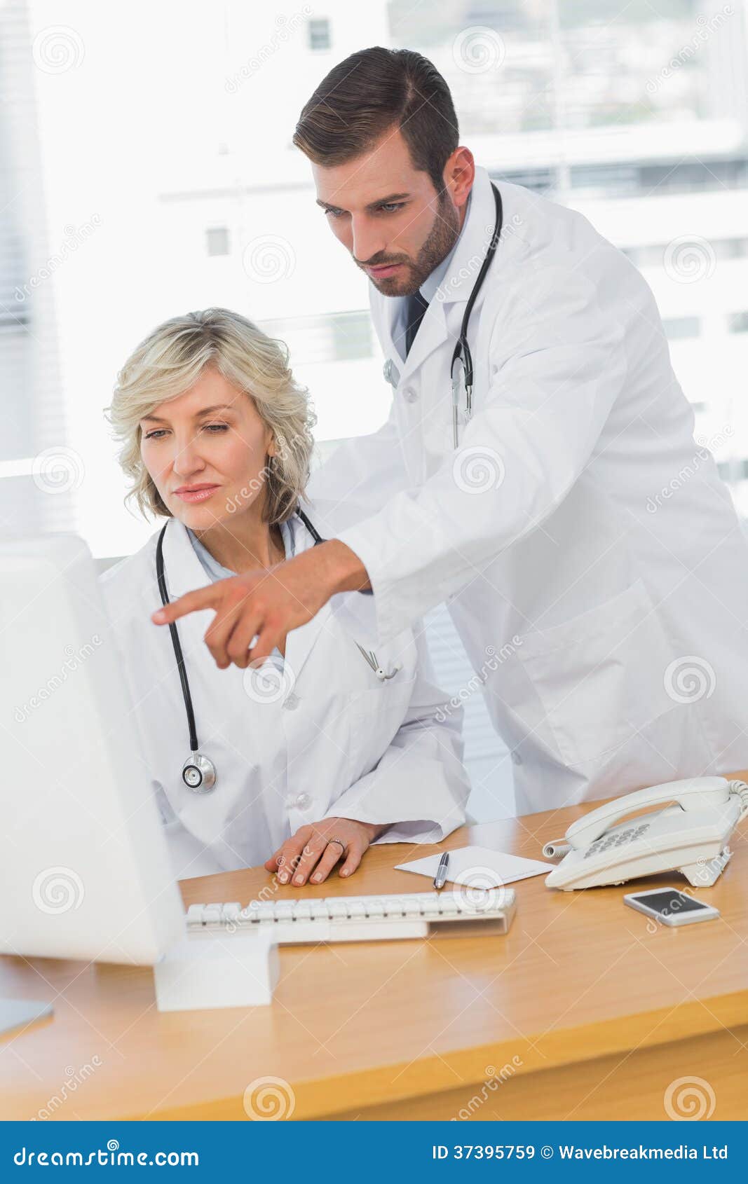 Doctors Using Computer at Medical Office Stock Image - Image of office ...