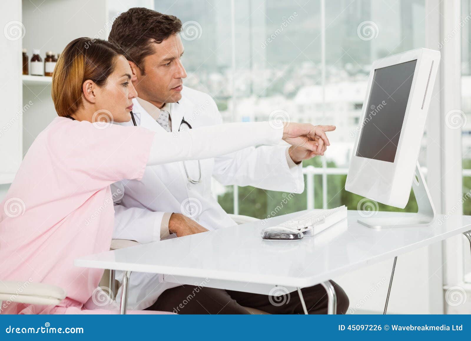 Doctors Using Computer at Medical Office Stock Photo - Image of ...