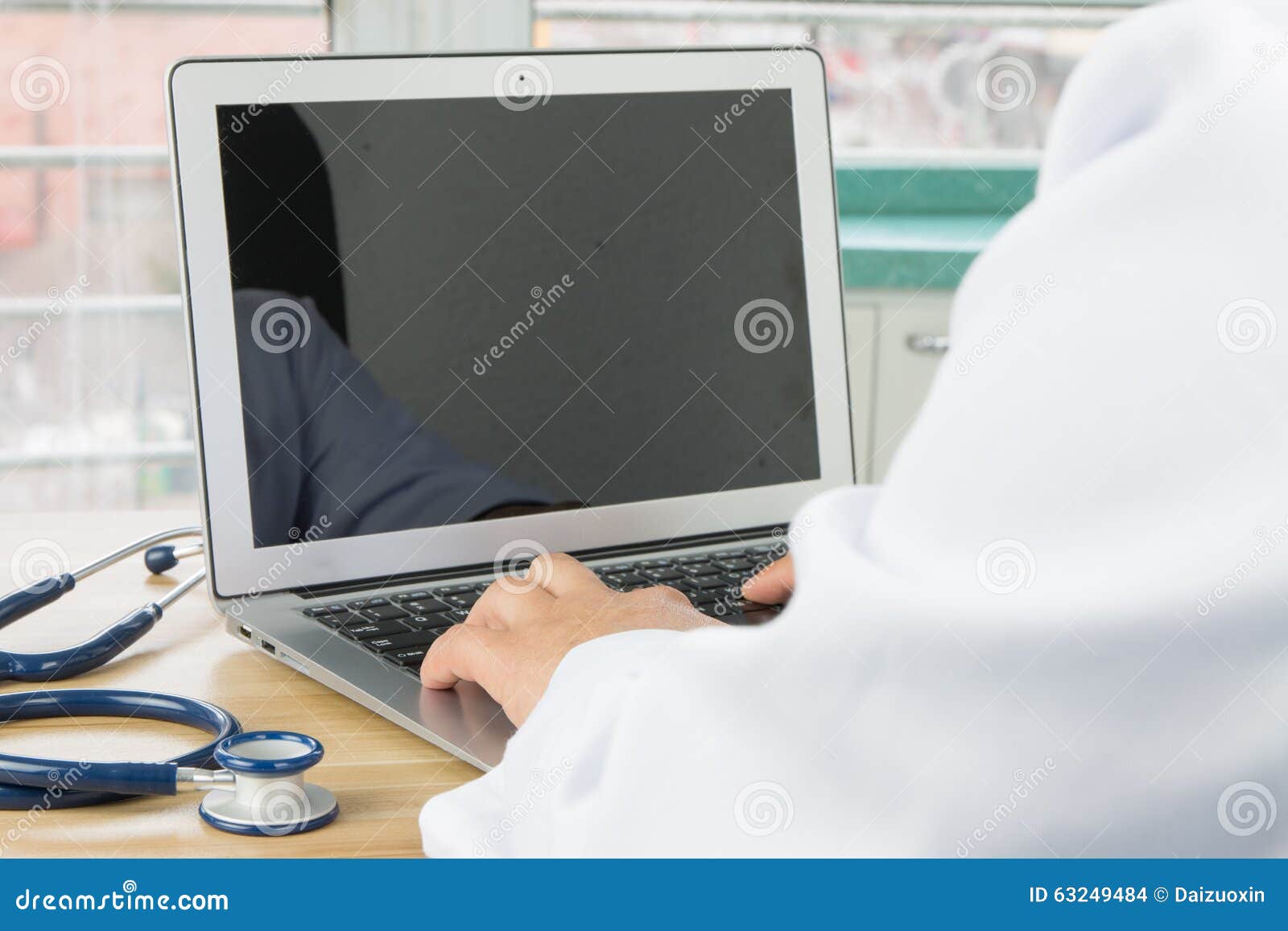 Doctors using laptop stock photo. Image of healthcare - 63249484