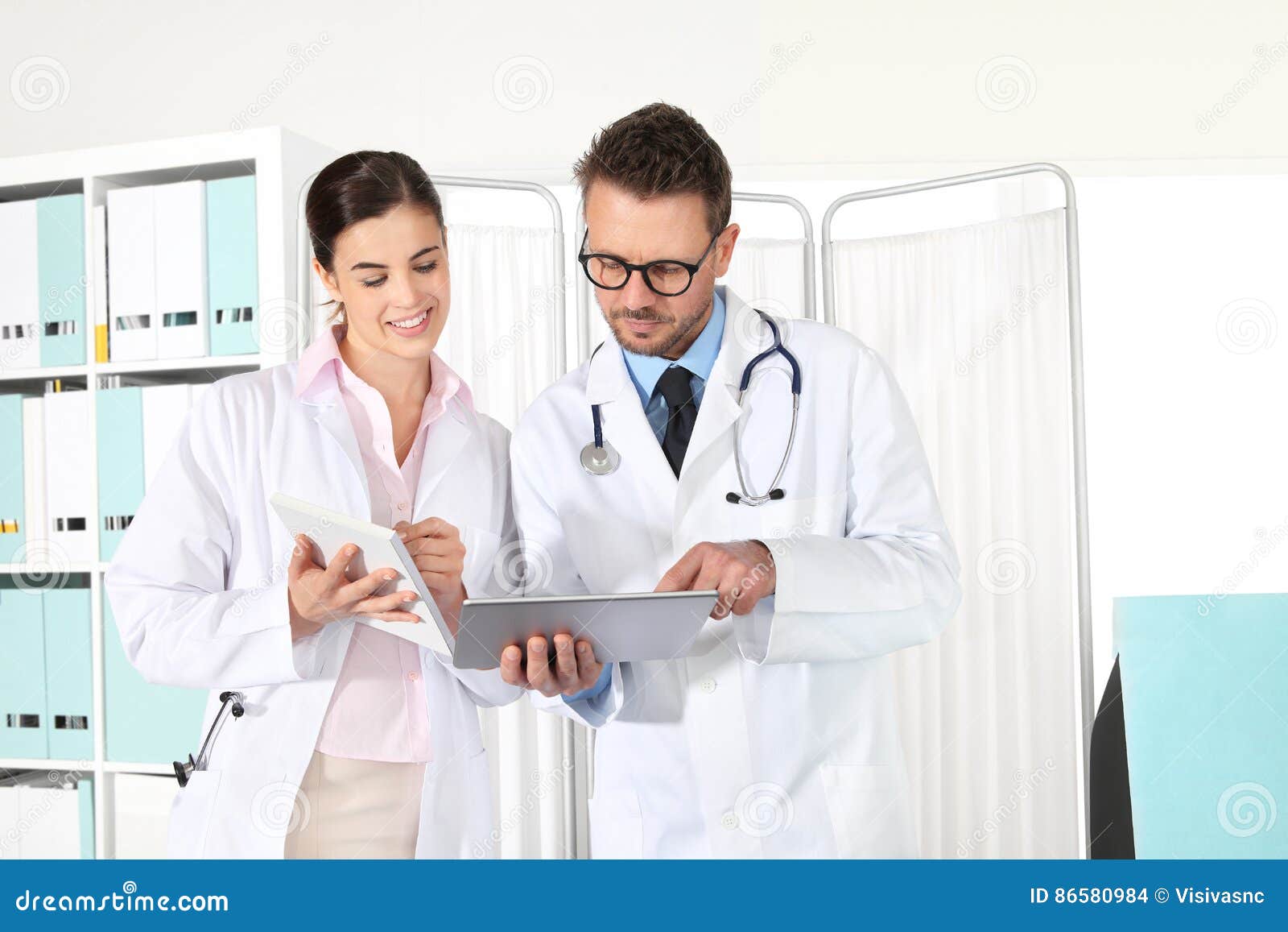 Doctors Using a Tablet, Concept of Medical Consulting Stock Photo ...
