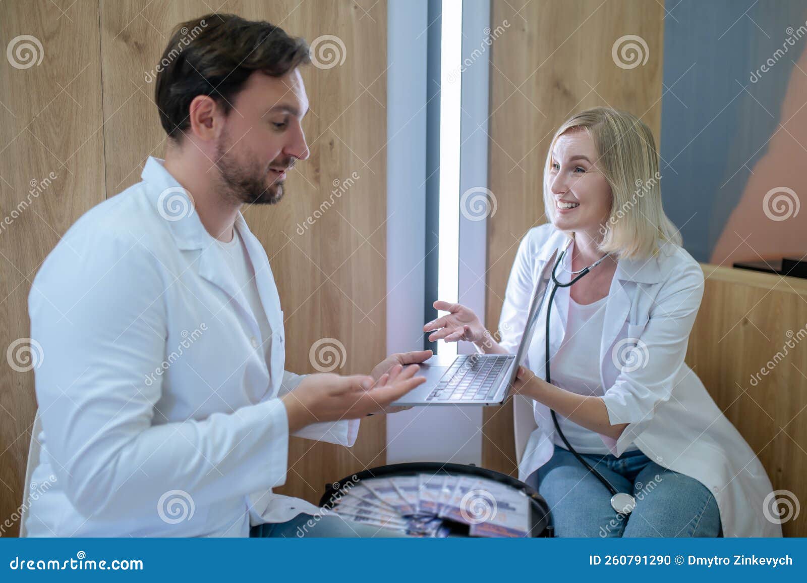 Two Young Doctors at Worki at the Hospital Stock Photo - Image of ...