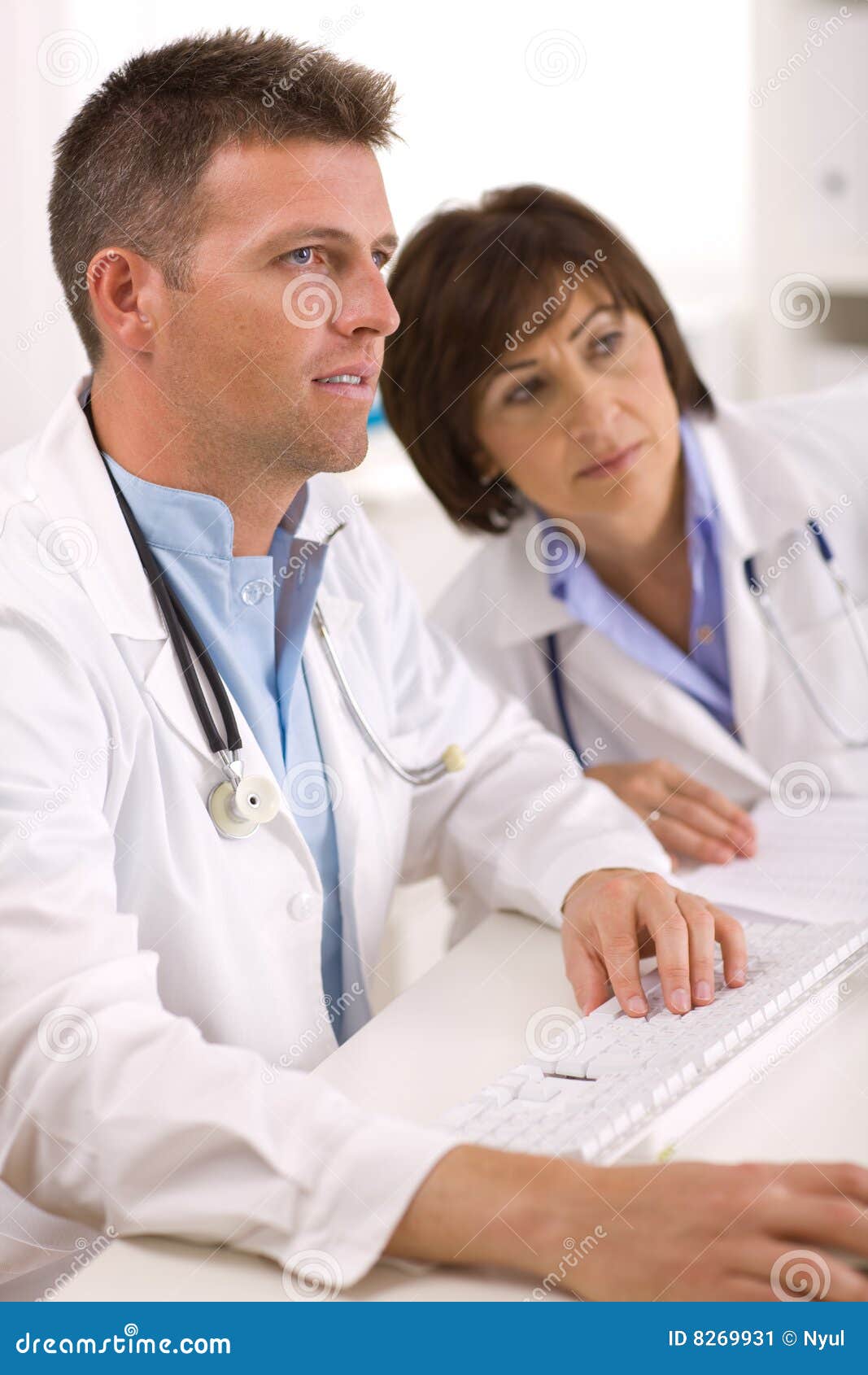 Doctors working at office stock image. Image of diagnose - 8269931