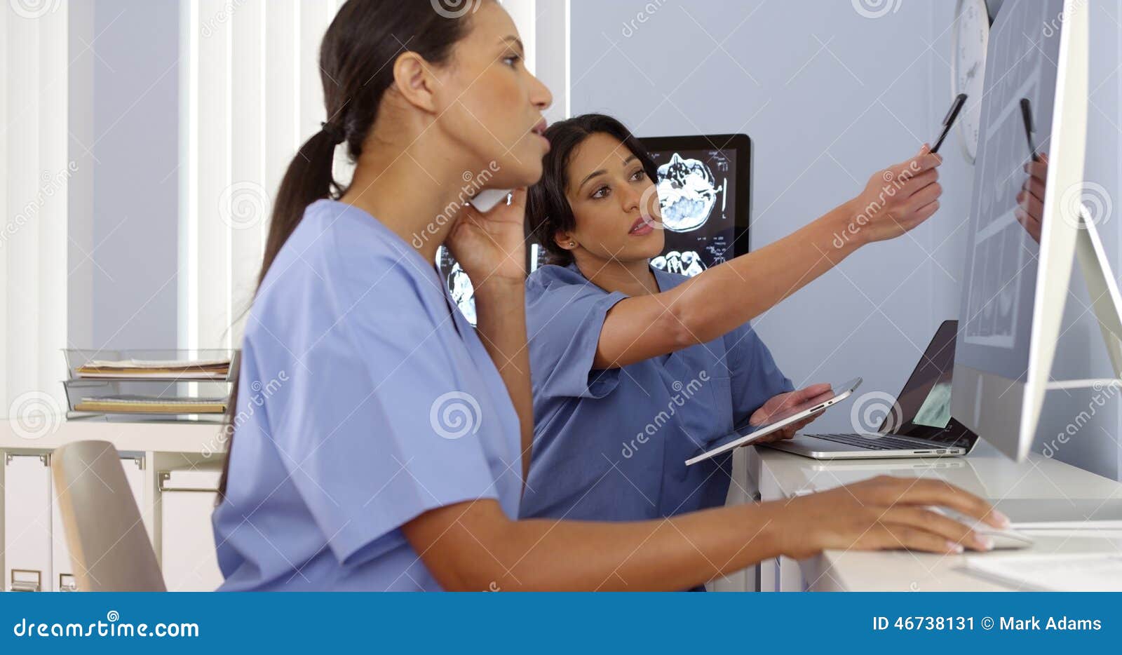 Doctors Working Together on Computers and Phone Stock Image - Image of ...
