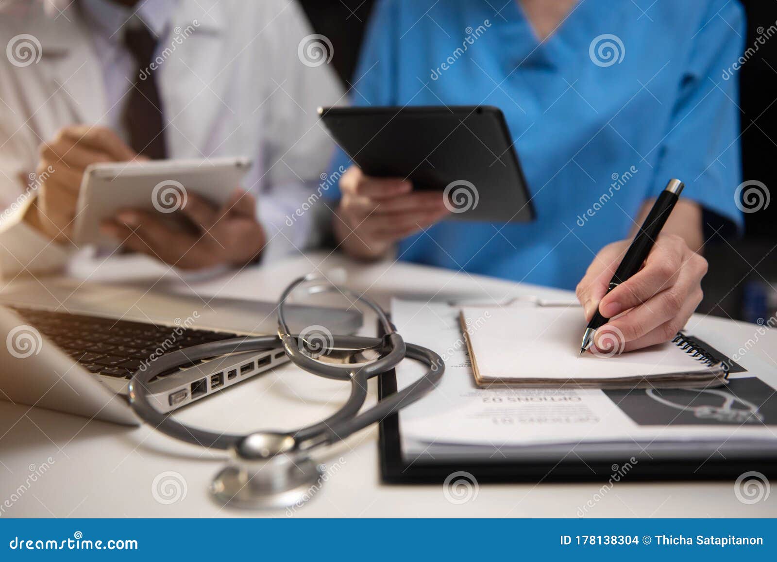 Doctors Working Together on Digital Tablet Healthcare Doctor Technology ...