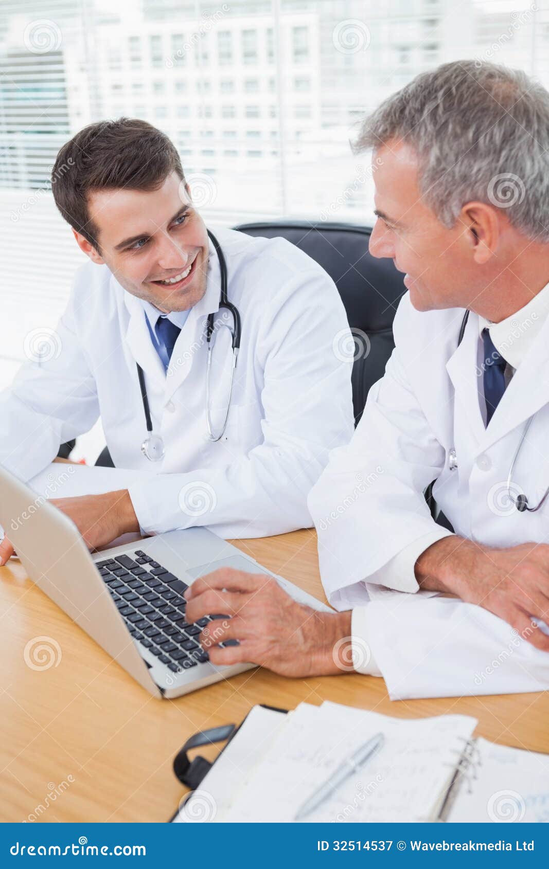 Doctors Working Together on Laptop Stock Image - Image of adult ...