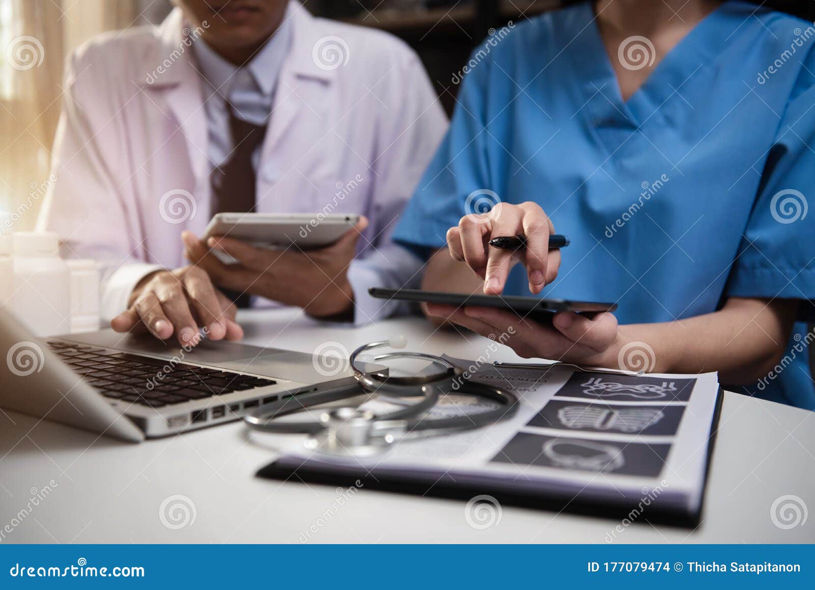 Doctors Working Together on Digital Tablet Healthcare Doctor Technology ... Doctors Working Together on Digital Tablet Healthcare Doctor Technology ...