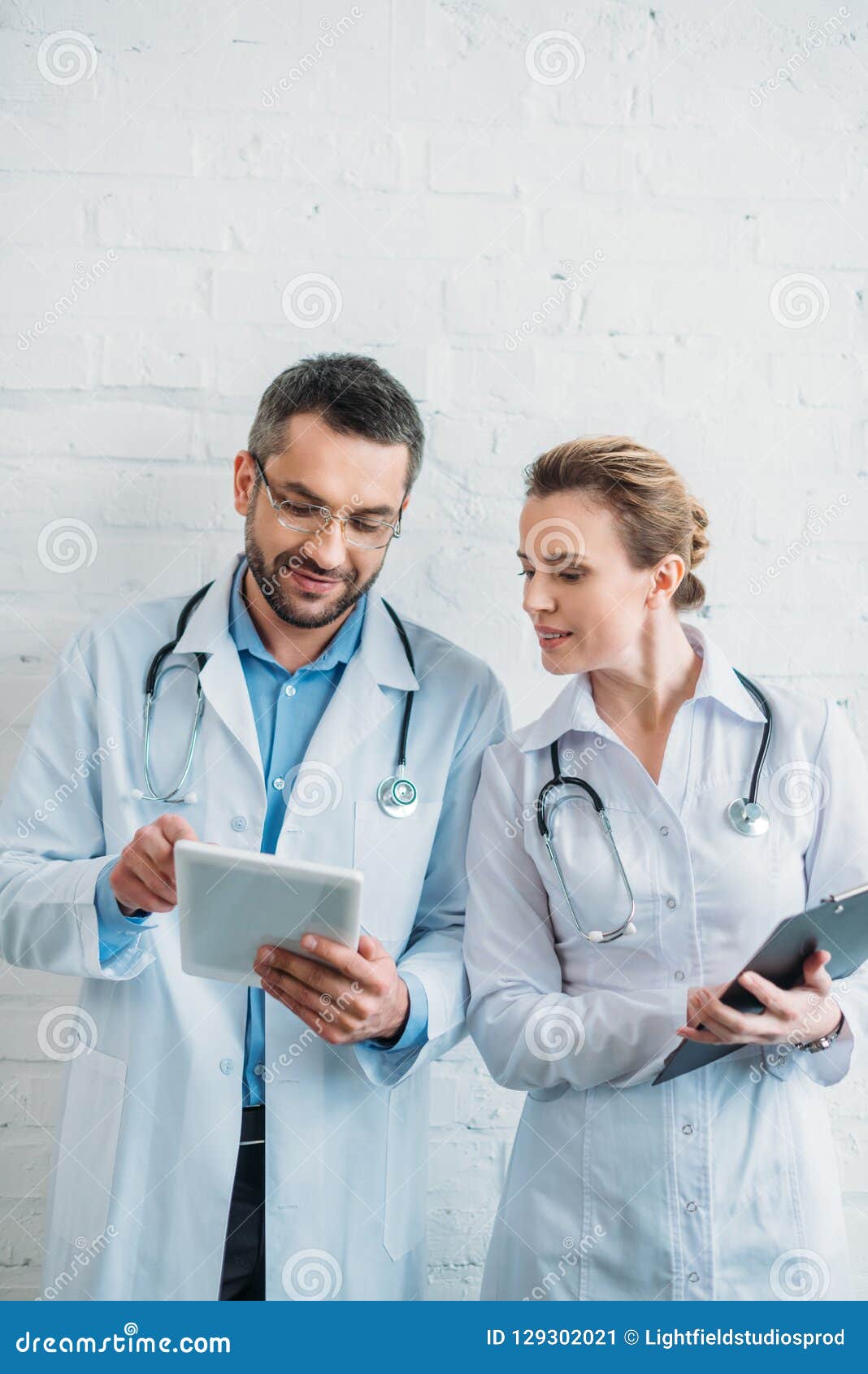 Doctors Working Together with Tablet Stock Image - Image of ...