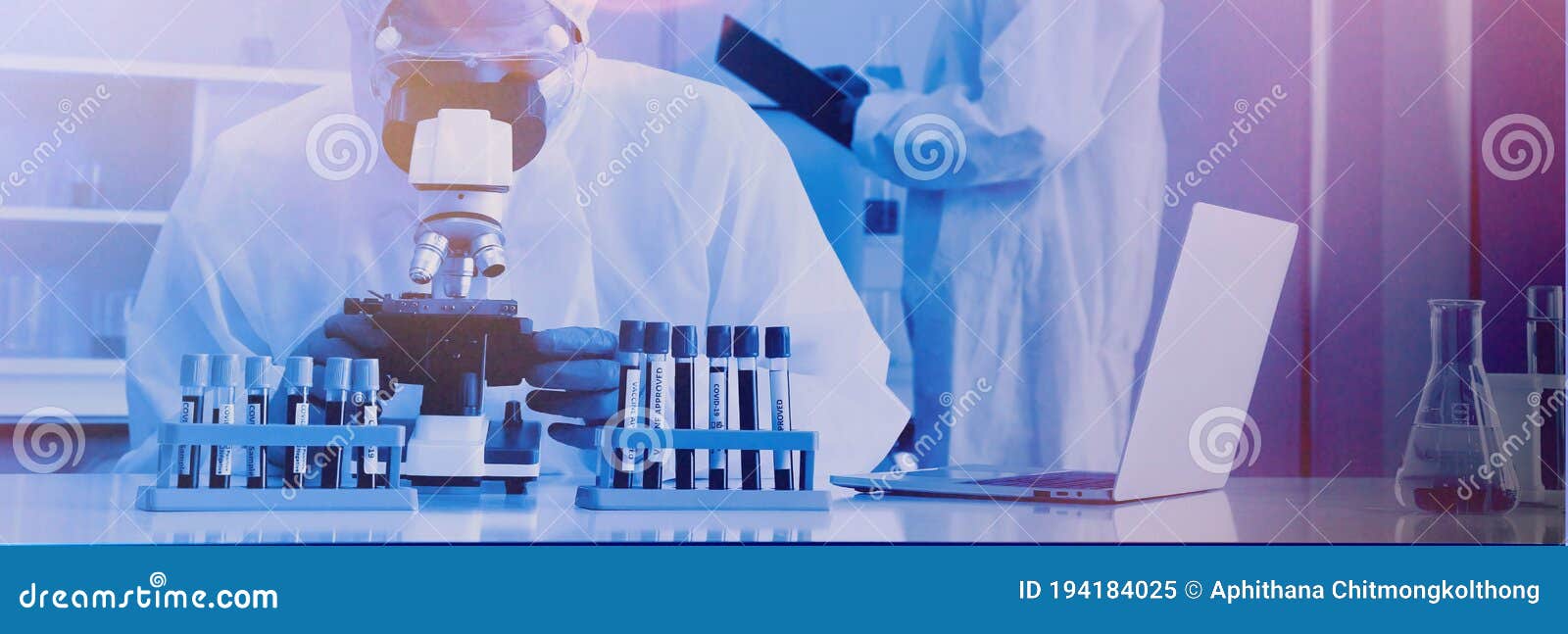 Doctors Working in Virus Lab. Doctor Using Microscope Check for Viruses ...