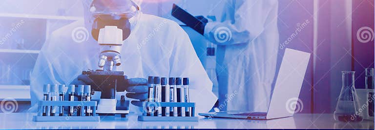 Doctors Working in Virus Lab. Doctor Using Microscope Check for Viruses ...