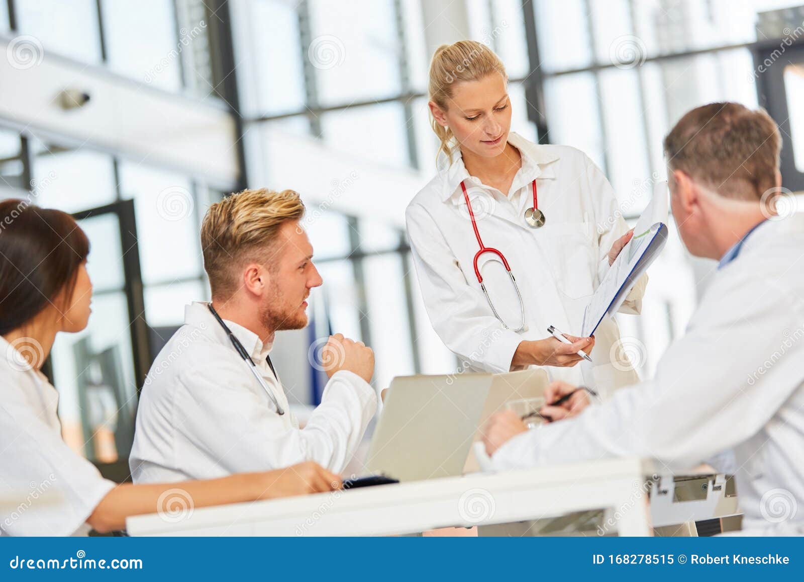 Doctors in a Workshop Discuss a Project Stock Image - Image of staff ...