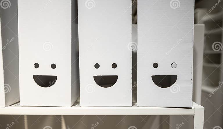 Document Folders with Cut Out Resembling Smiley Faces.. Stock Photo ...
