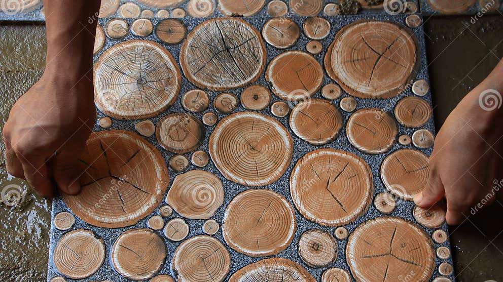 Construction Workers when Installing Ceramic Tiles for Floors Stock ...