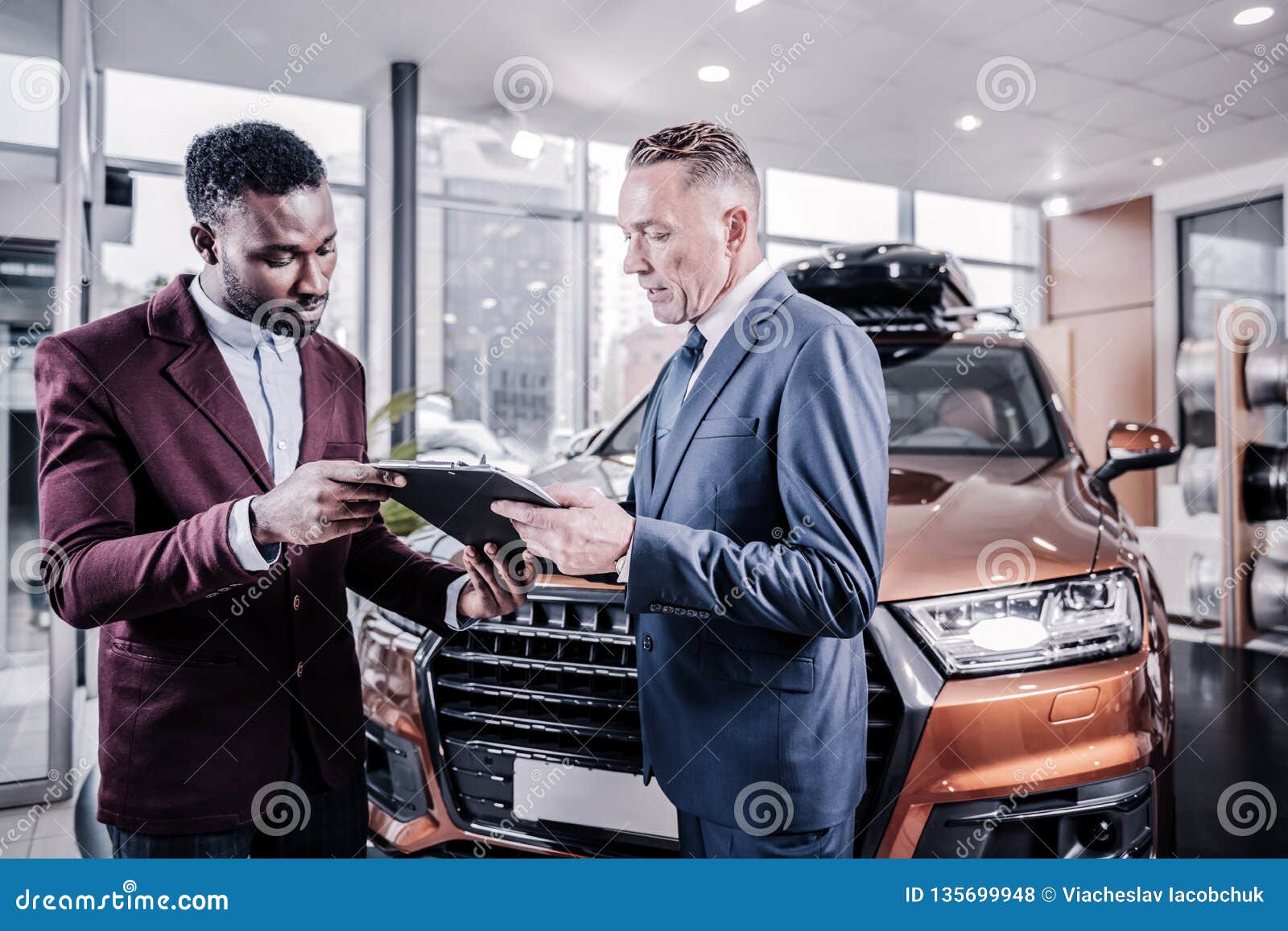 Sales Manager Giving His Client Documents before Buying Car Stock Photo ...