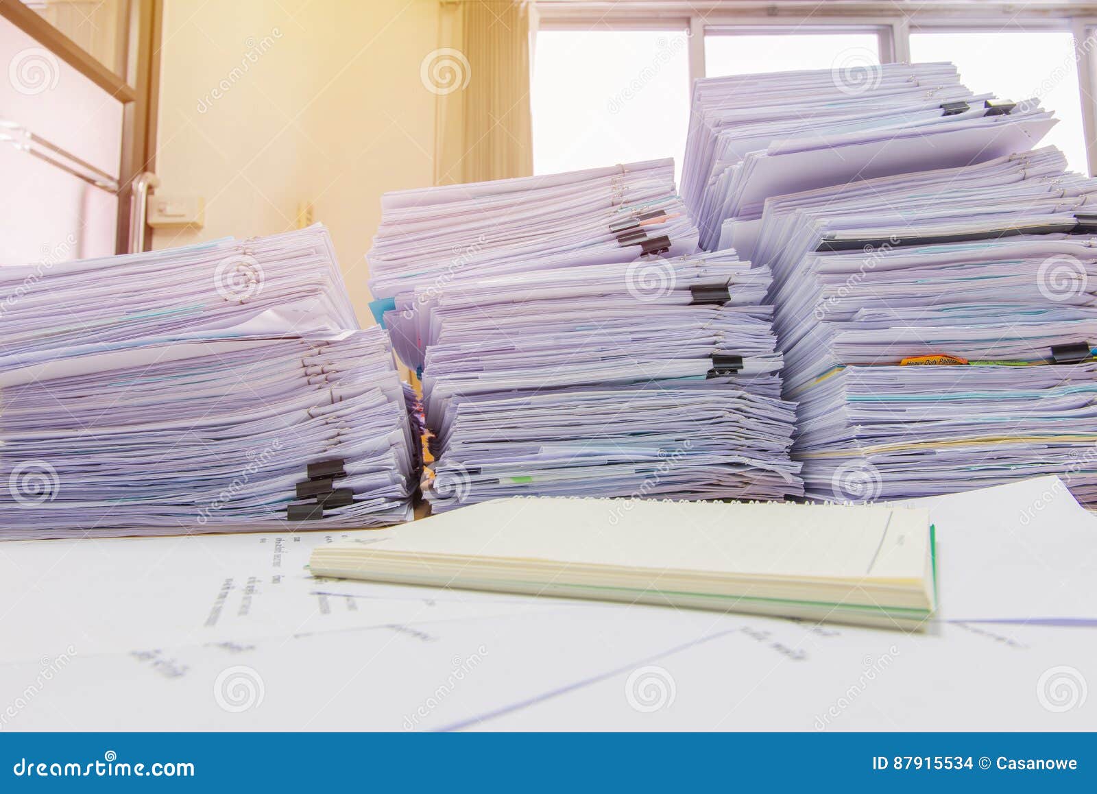 Documents on Desk Stack Up High Waiting To Be Managed Stock Photo ...
