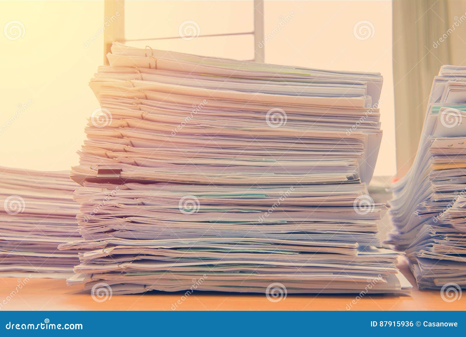 Documents on Desk Stack Up High Waiting To Be Managed Stock Photo ...