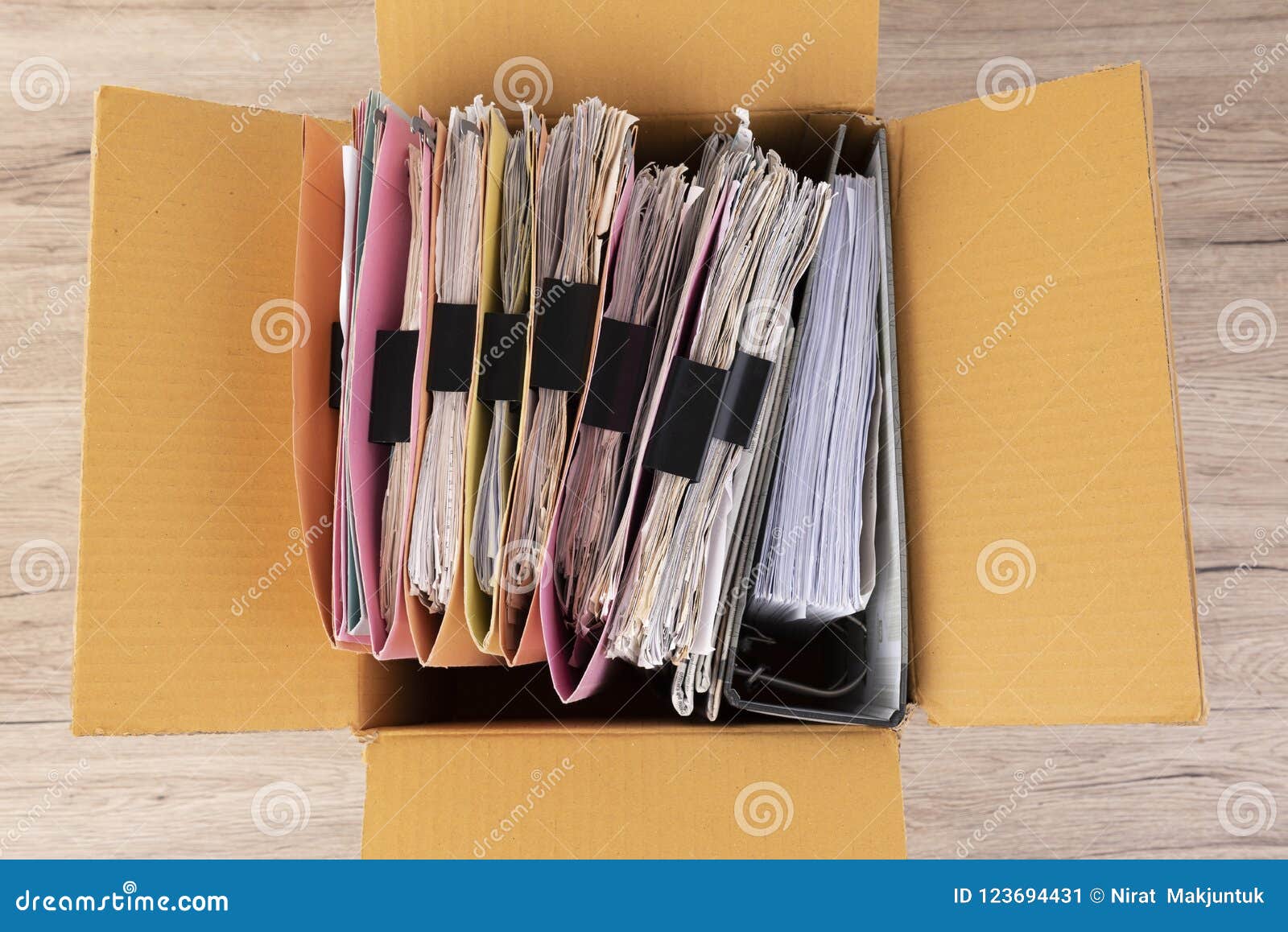 The Documents and Files are Placed in a Brown Box Stock Image - Image ...