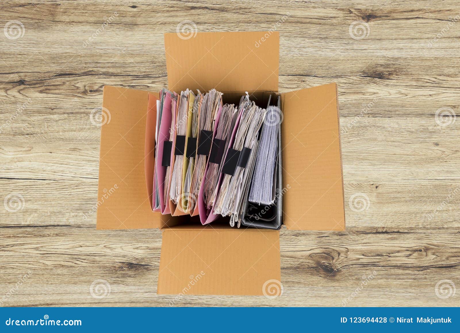The Documents and Files are Placed in a Brown Box Stock Photo - Image ...
