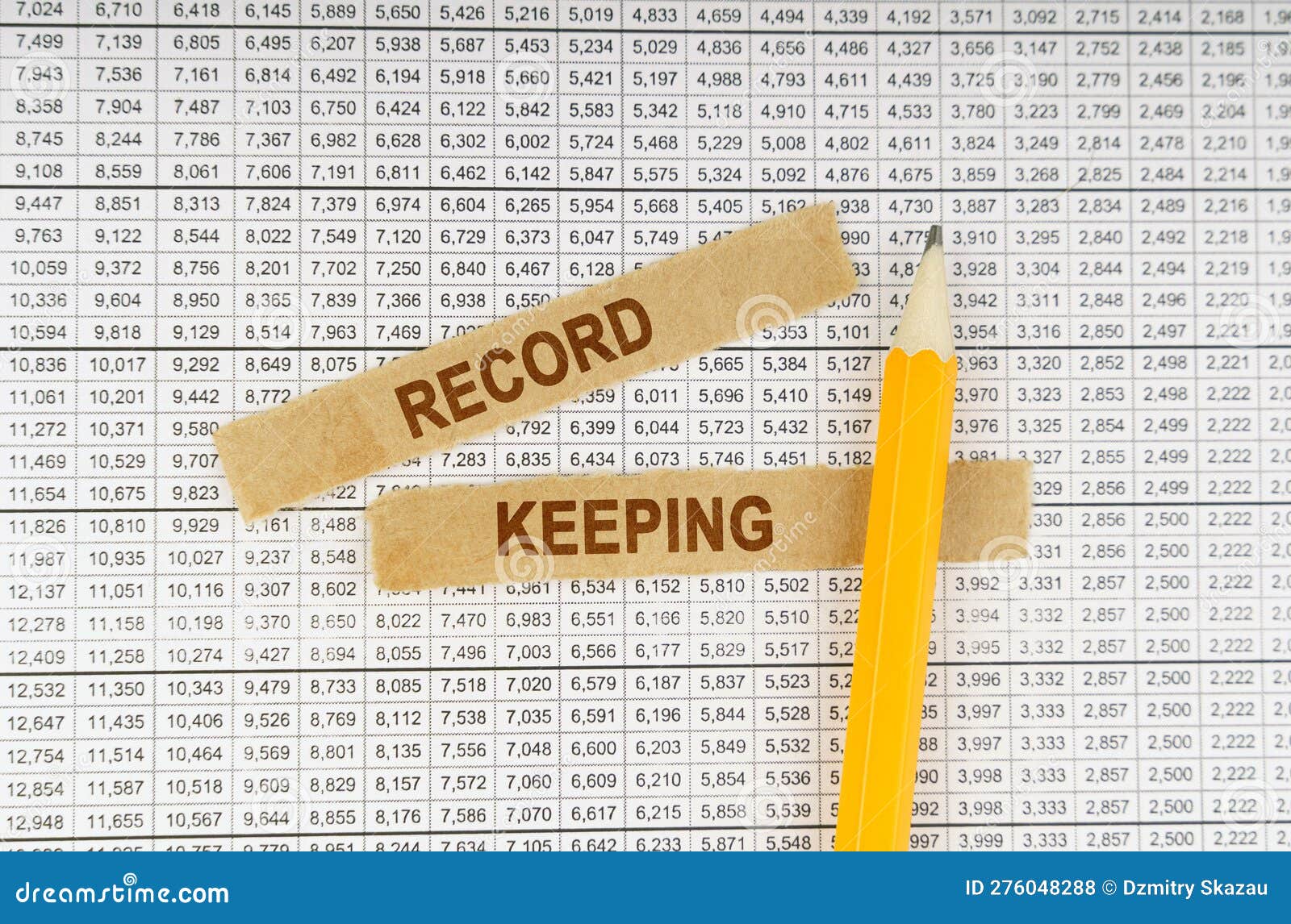 On the Documents with Reports are a Pencil and Strips of Paper with the ...