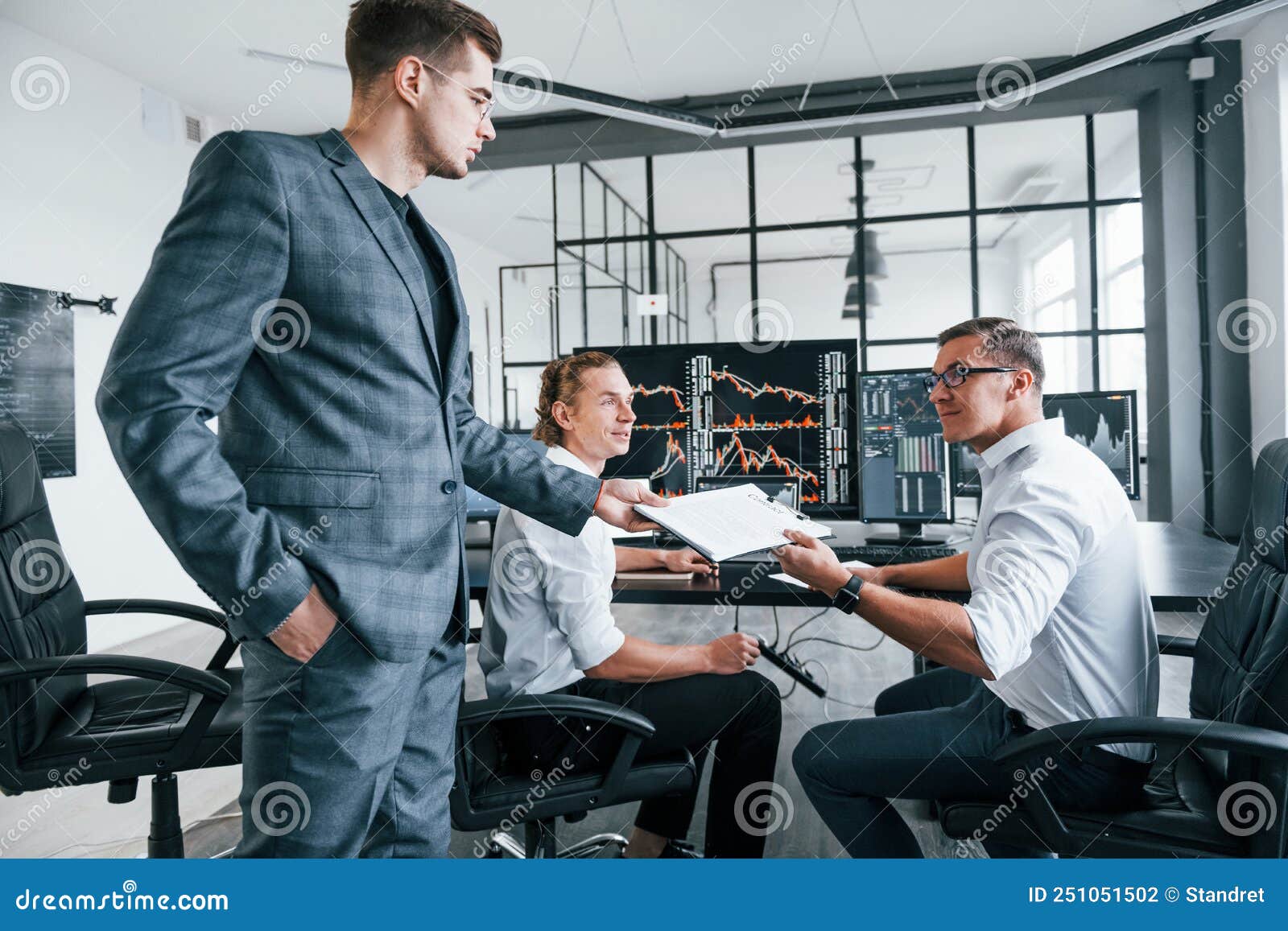 With Documents. Team of Stockbrokers Works in Modern Office with Many ...
