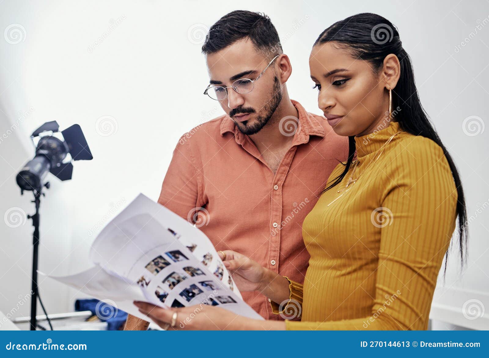 Documents, Teamwork or Planning with a Photographer and Model Talking ...