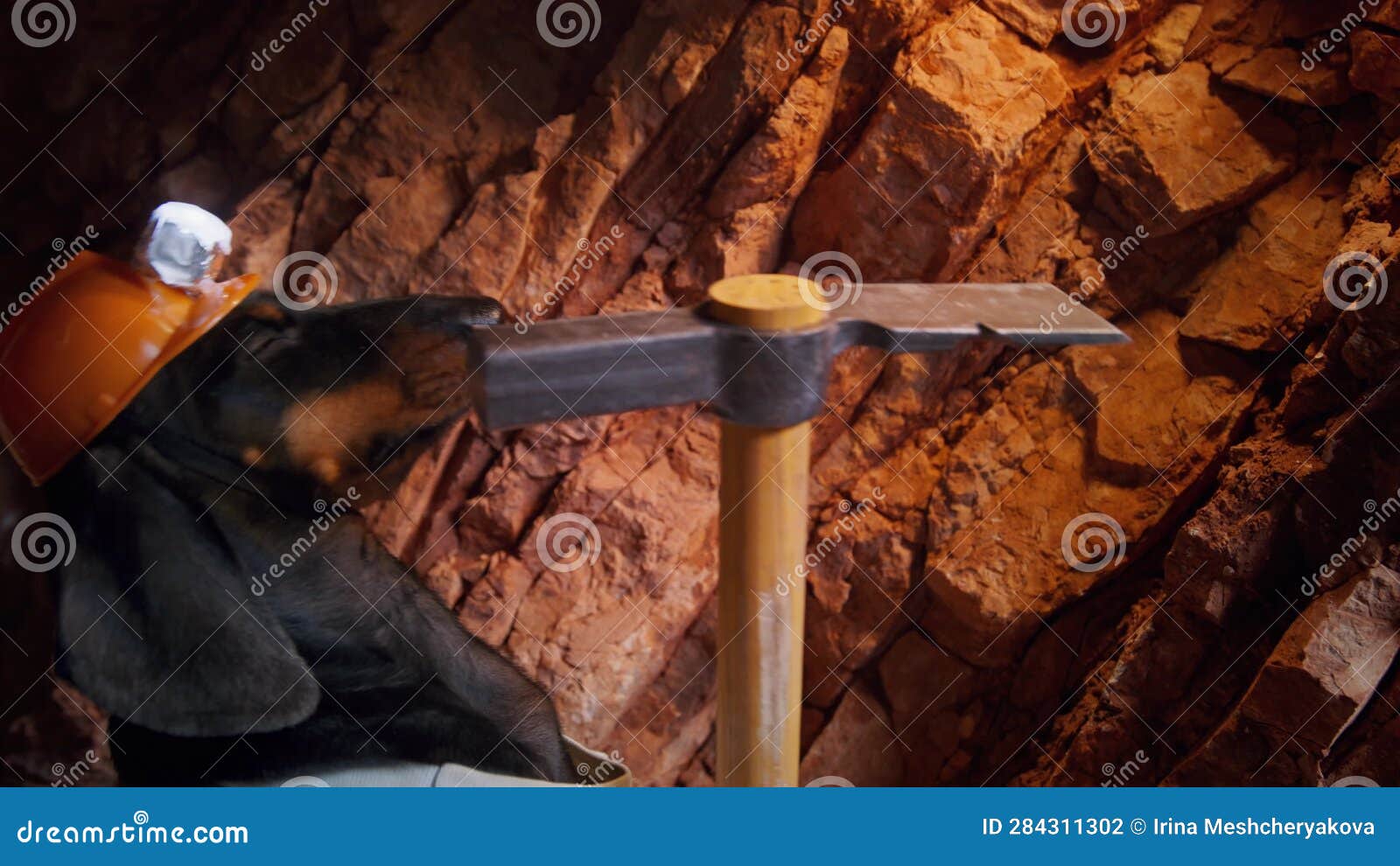 Dog in Helmet Flashlight Pickaxe Knocks on Rock in Cave Underground ...