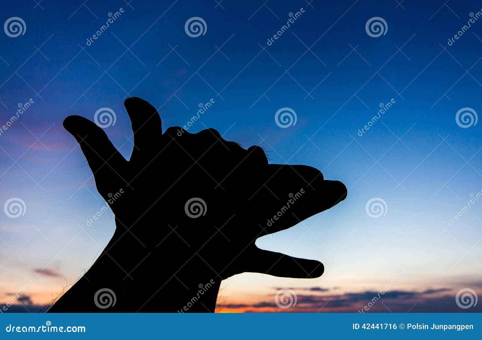Dog shape hand silhouette stock photo. Image of arms - 42441716