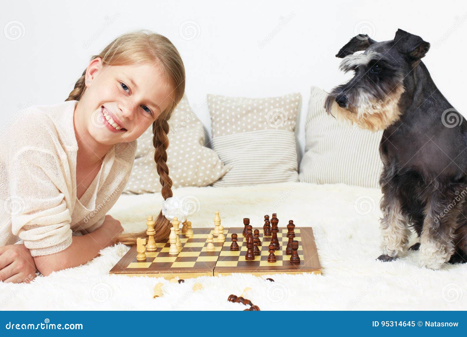 The Dog Teaches the Child To Play Chess. Stock Image - Image of ...