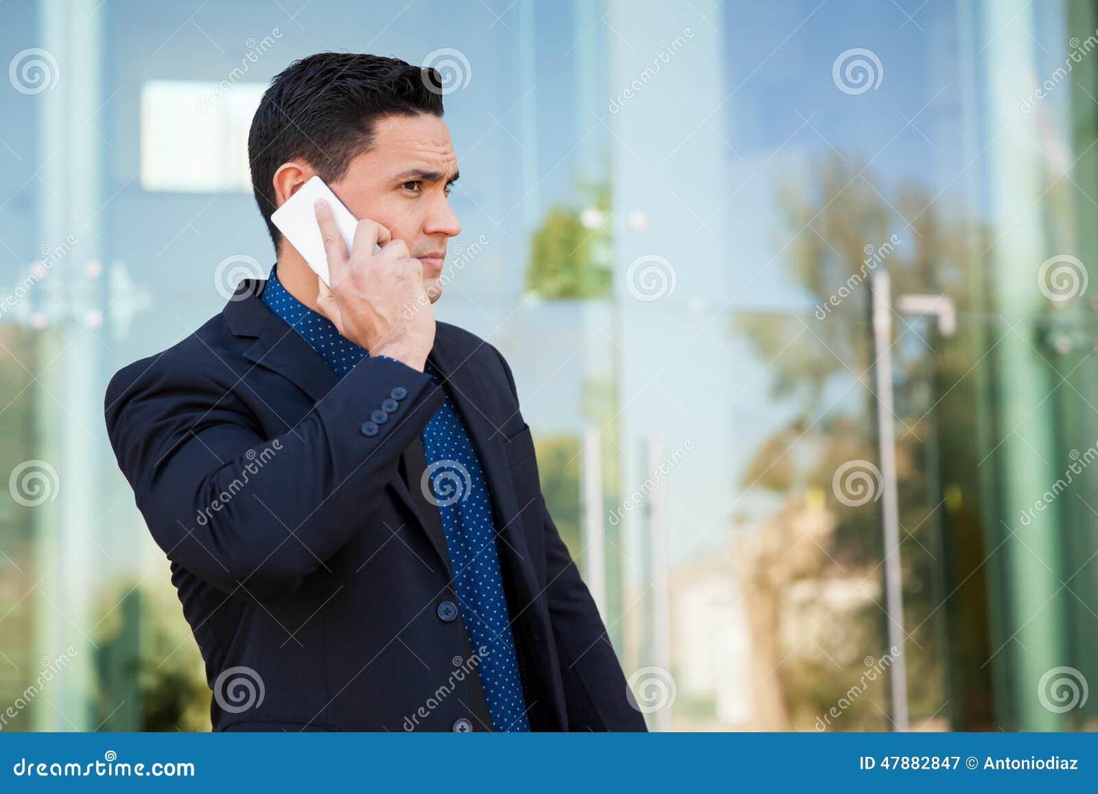 Doing Business Over the Phone Stock Image - Image of handsome ...
