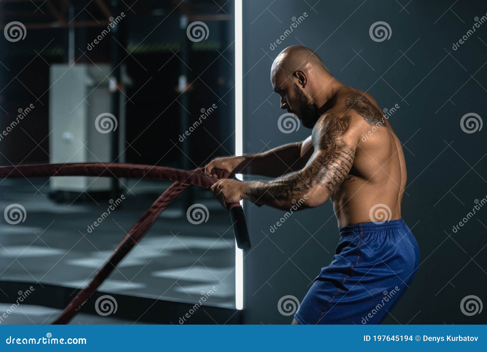Doing exercises with rope stock photo. Image of power - 197645194