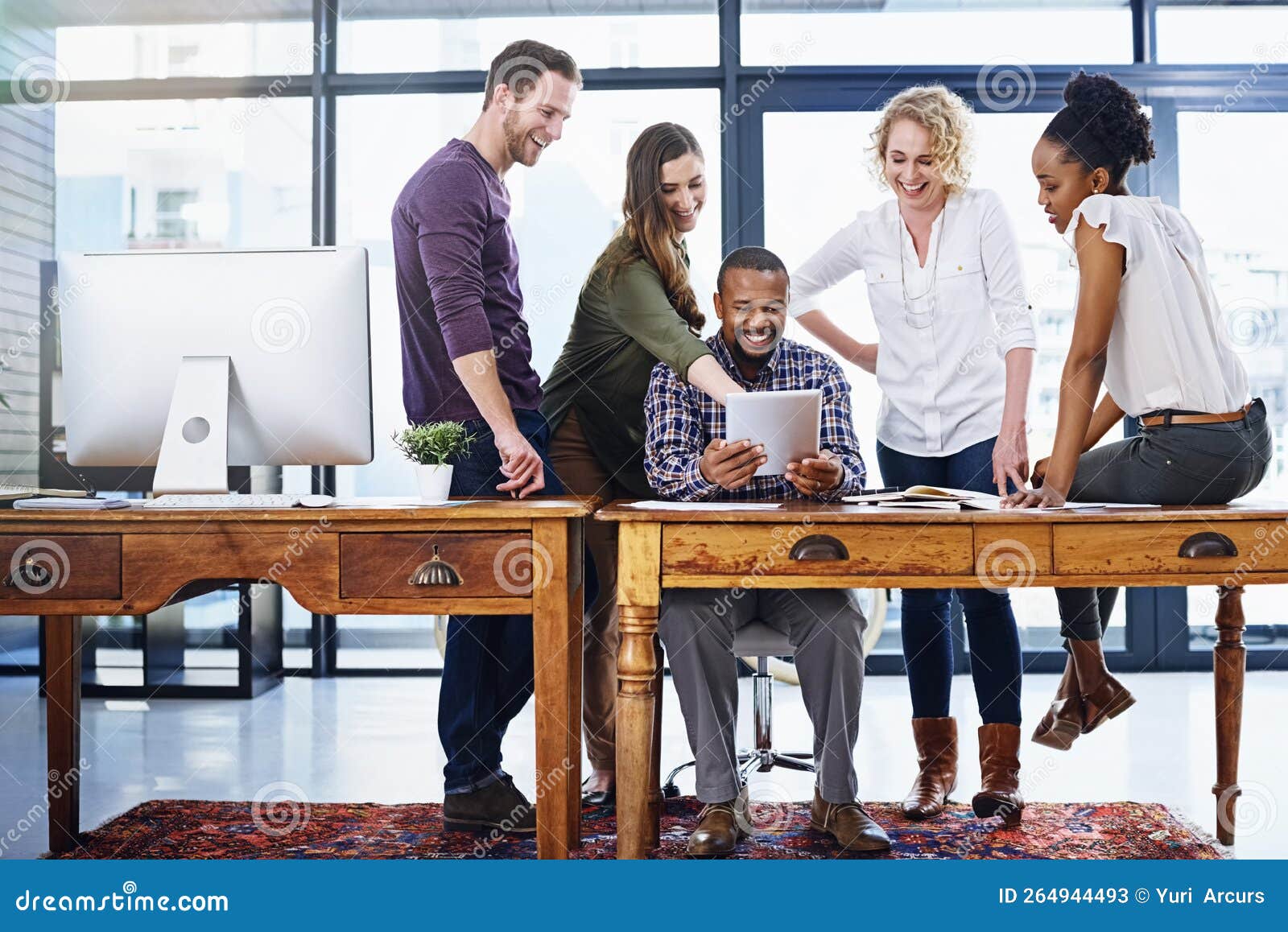 Doing Great Work Together. a Team of Designers Working Together in the ...