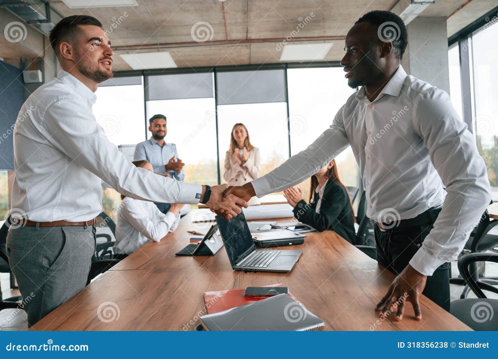 Doing Handshake. Group of Office Workers are Together Indoors Stock ...