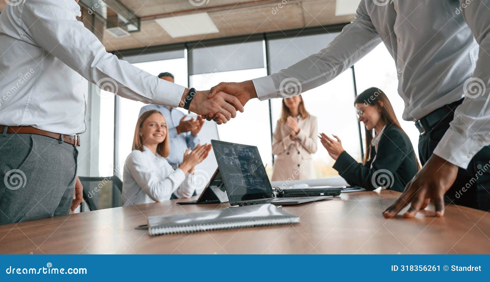 Doing Handshake. Group of Office Workers are Together Indoors Stock ...