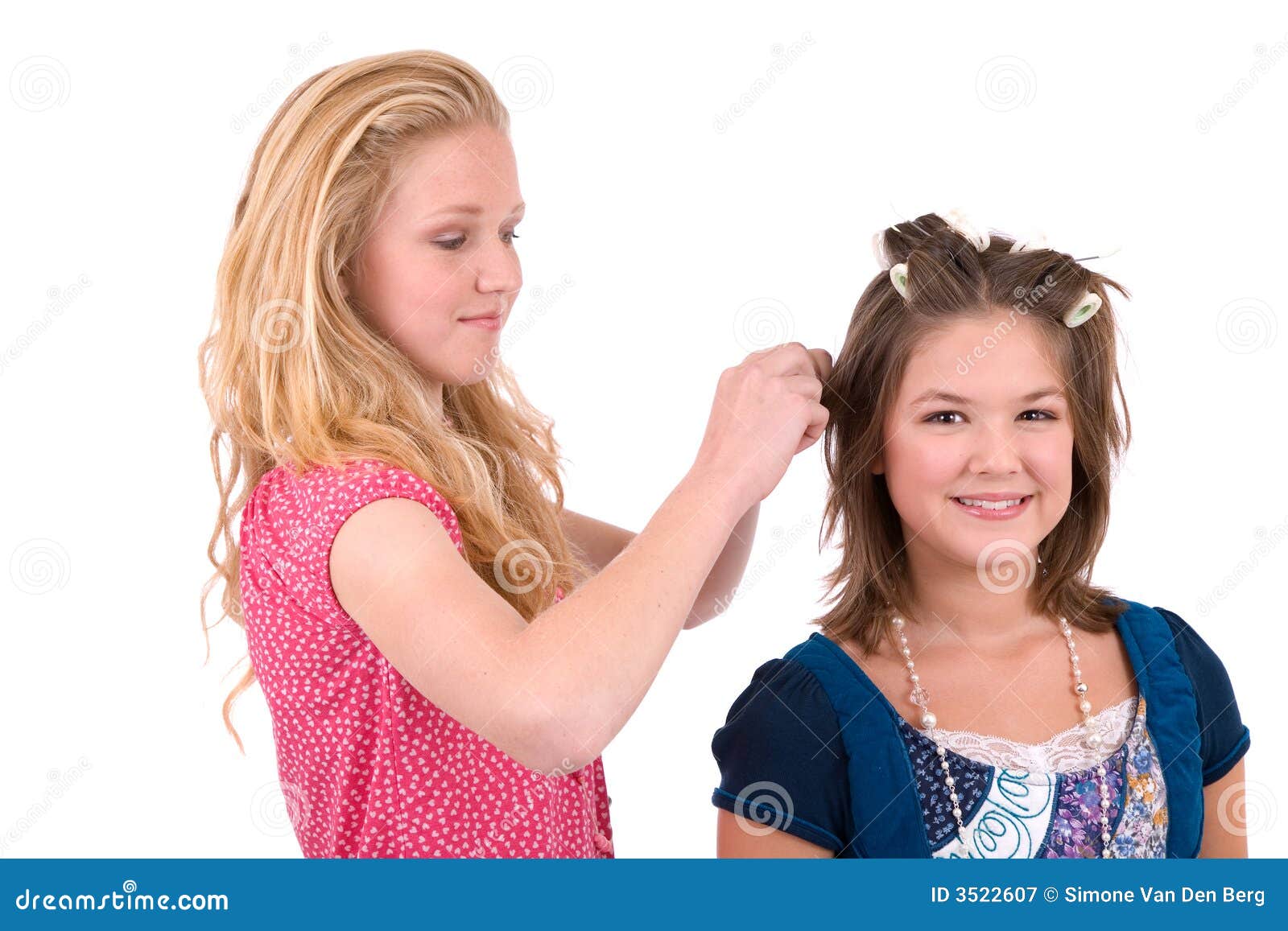 Doing her hair stock image. Image of schoolgirls, beautiful - 3522607